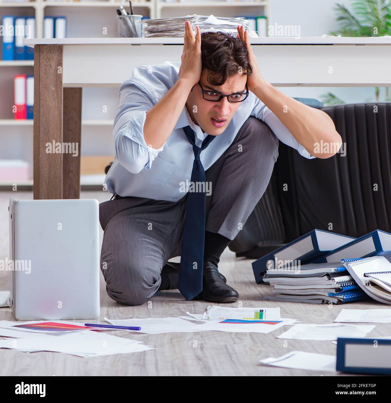 The bankrupt businessman angry in the office floor Stock Photo - Alamy