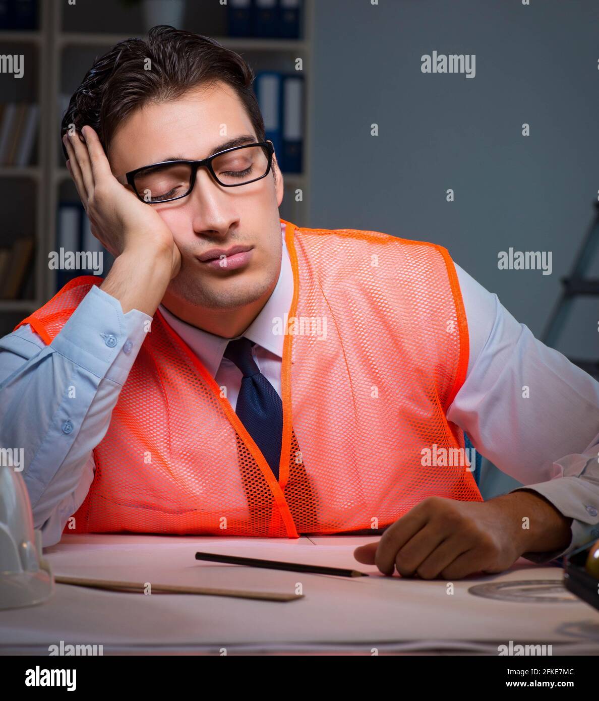 The construction architect working on drawings late at night Stock ...