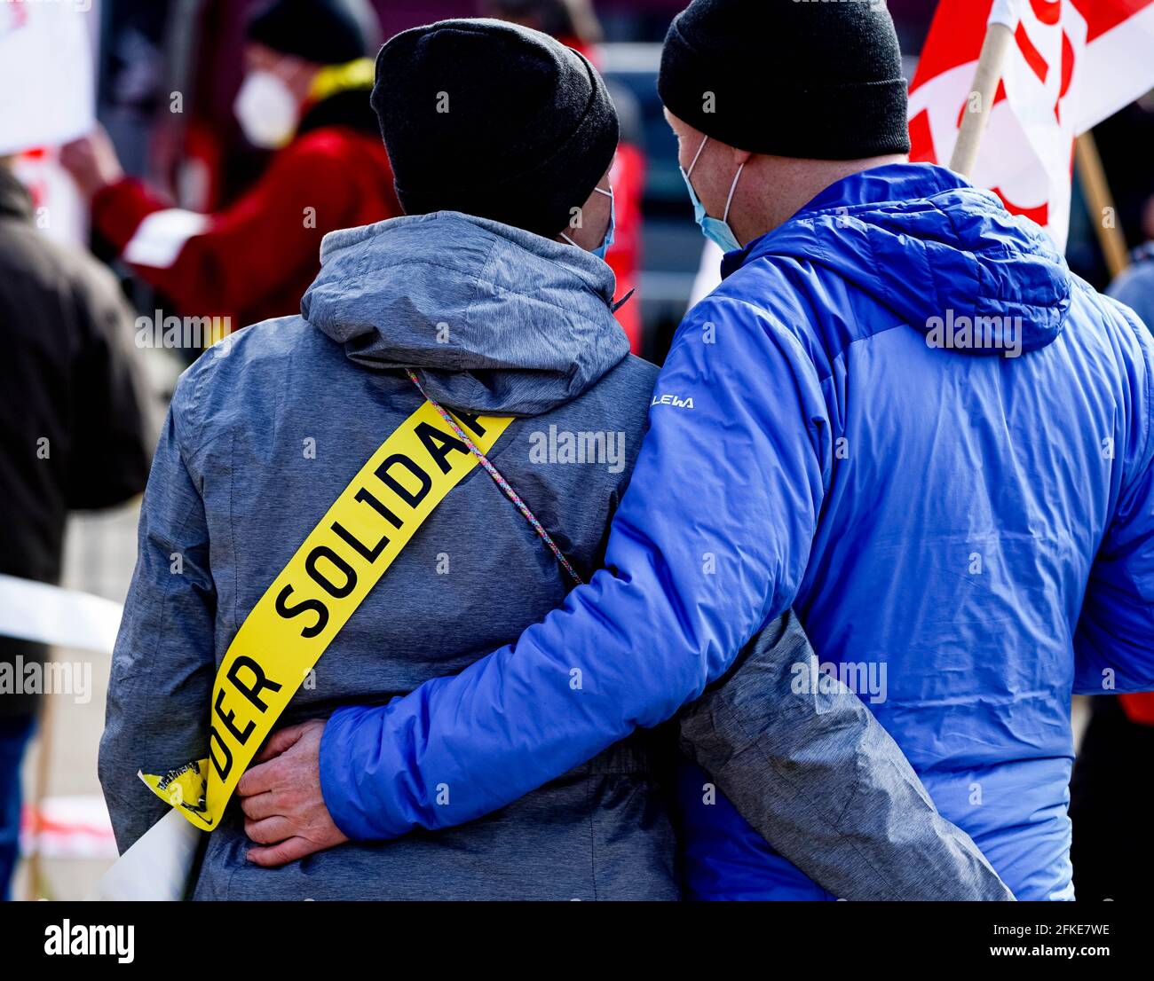 01 May 2021, Hamburg: Participants of the main rally of the German ...
