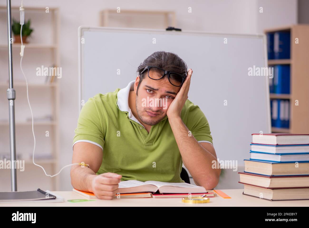 Young sick teacher student in blood transfusion concept Stock Photo - Alamy