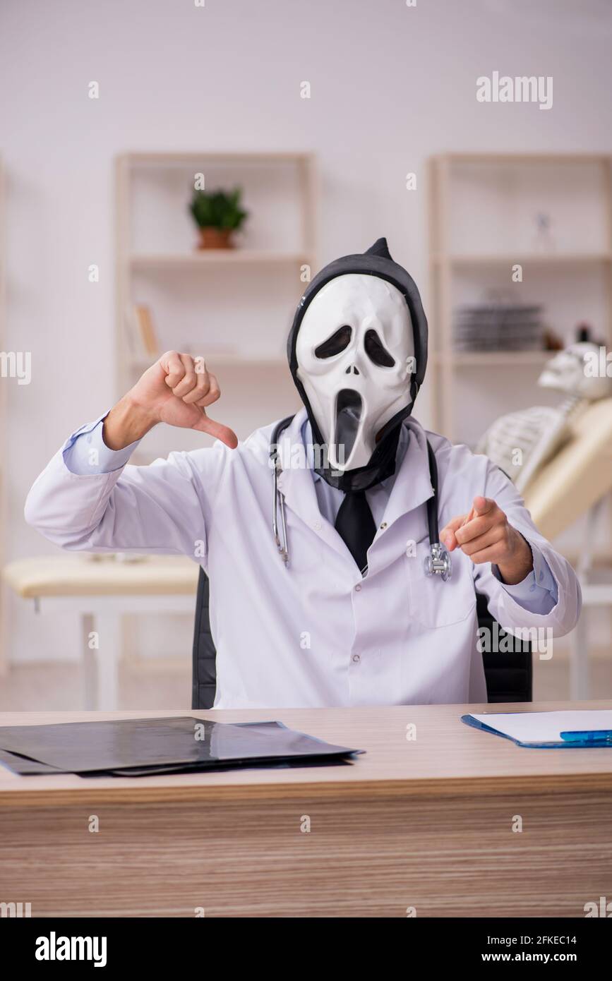 Devil doctor working at the hospital Stock Photo - Alamy