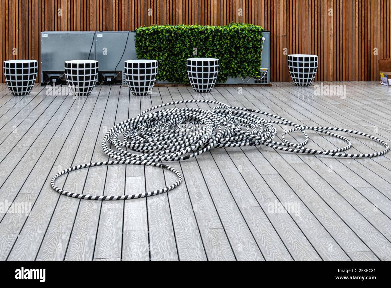 Pile of black & white Hula hoops at the O2 Arena, Greenwich Peninsula ...
