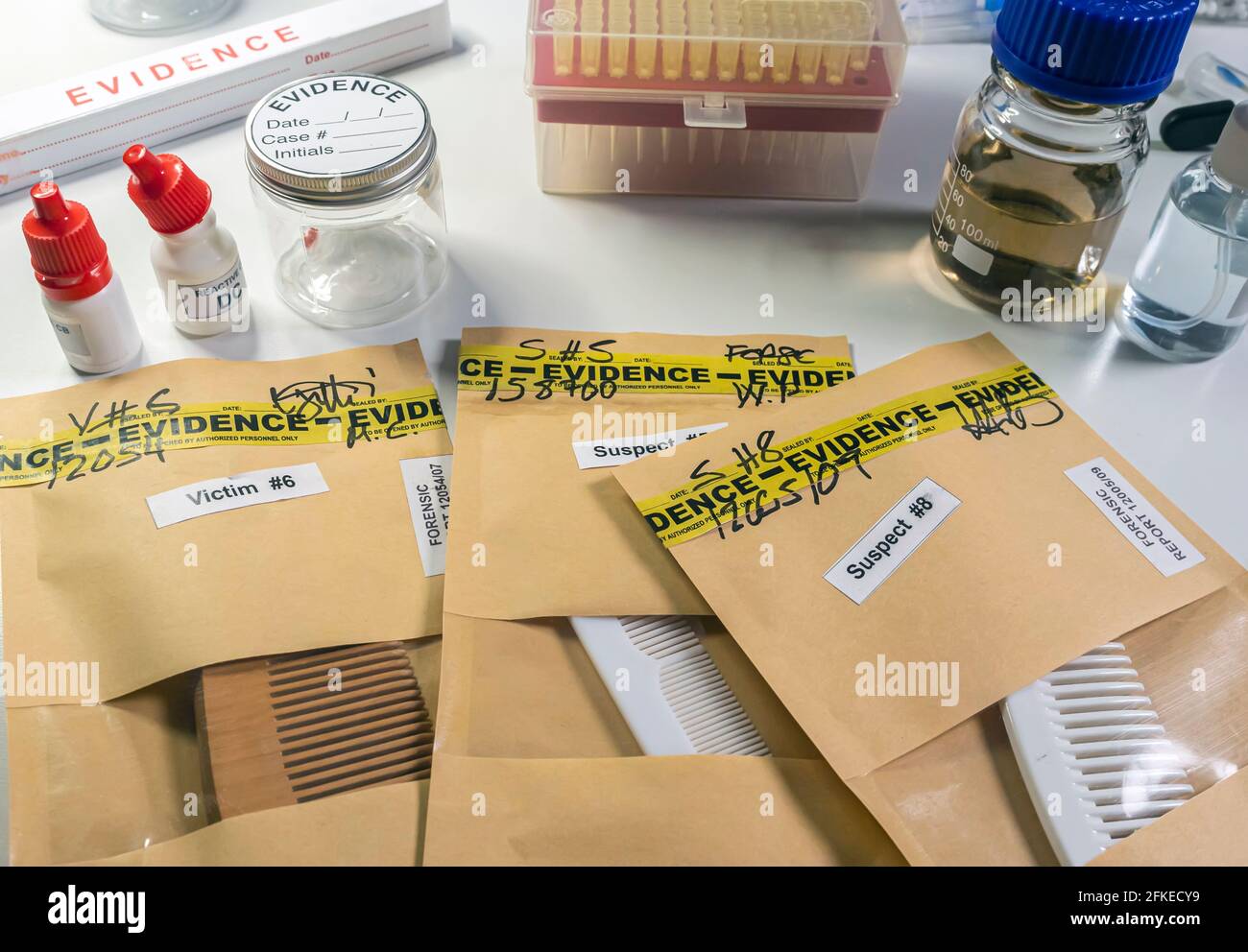 evidence bags with combs from a murder case, concept image Stock Photo ...