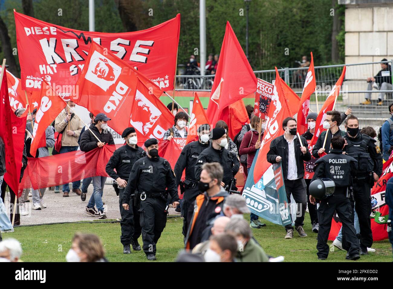 Munich, Germany. 01st May, 2021. Police officers accompany a rally of ...