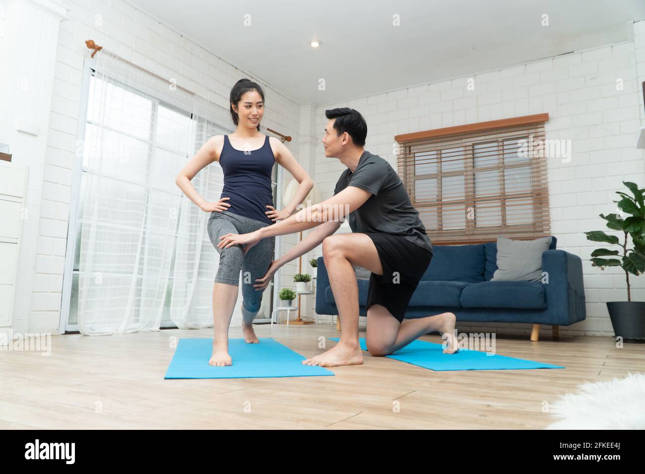 Husband wife trainer workout in hi-res stock photography and images - Alamy