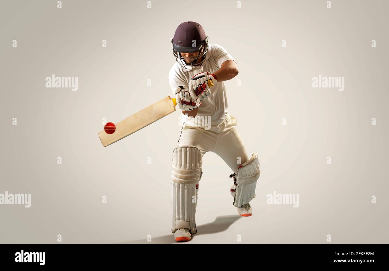 Cricketer, batsman hitting a shot Stock Photo - Alamy