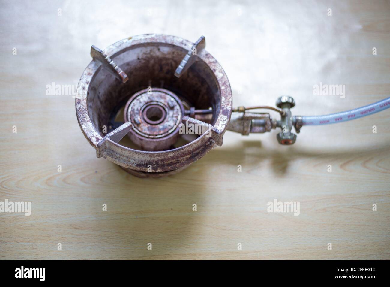Aged portable high-pressure propane burner on a table Stock Photo - Alamy
