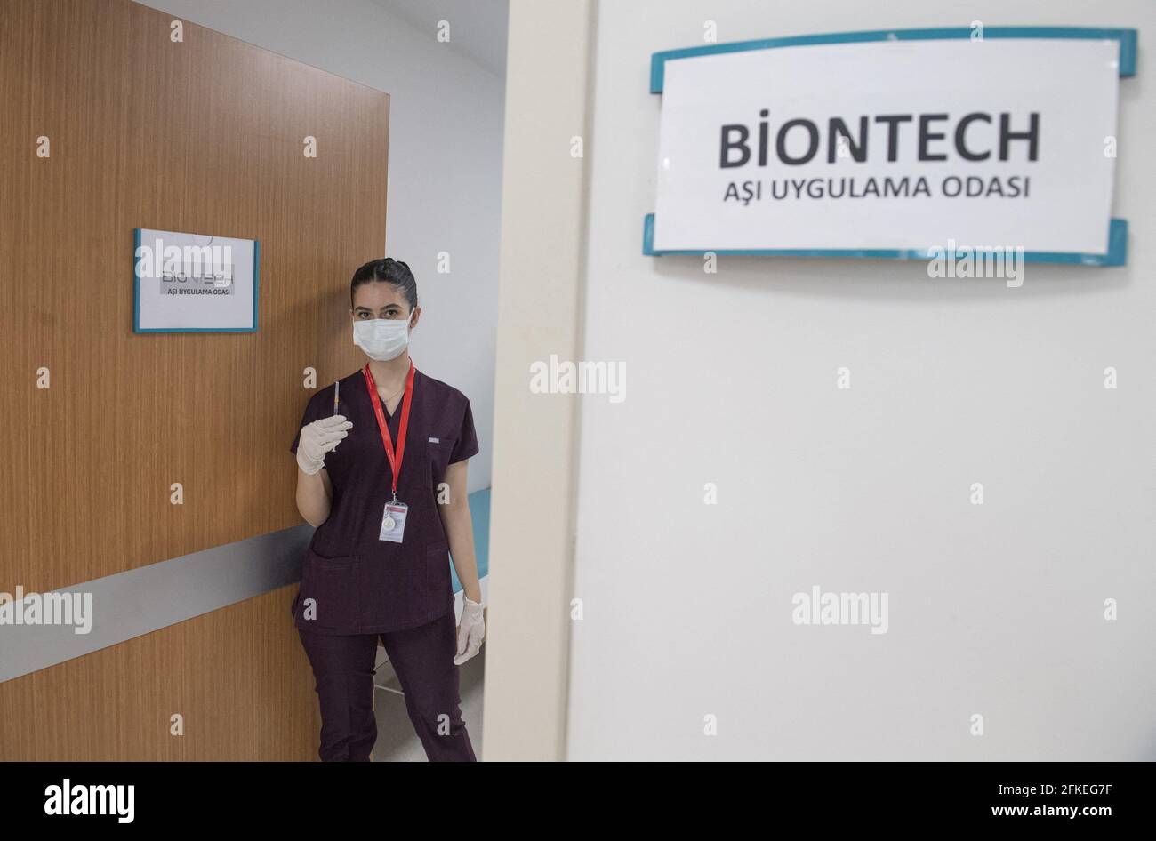 Turkish nurse poses with Pfizer BioNTech vaccine at the Etimesgut Sehit ...
