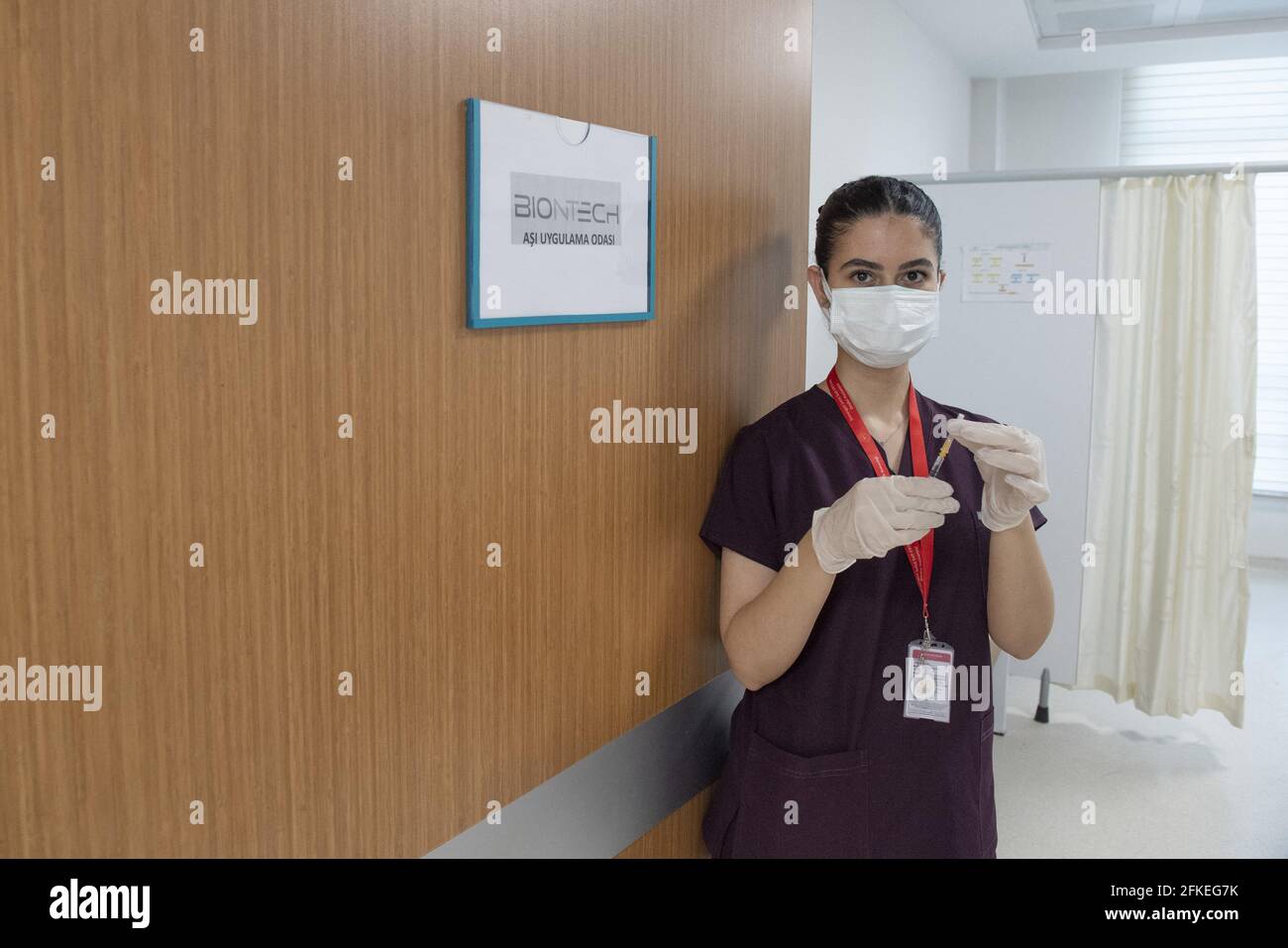 Turkish nurse poses with Pfizer BioNTech vaccine at the Etimesgut Sehit ...