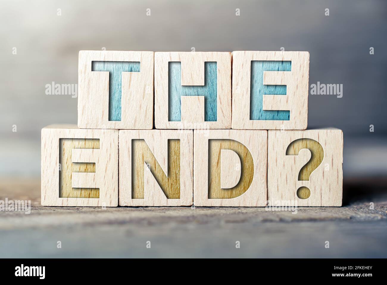 The End Written On Wooden Blocks On A Board Stock Photo - Alamy
