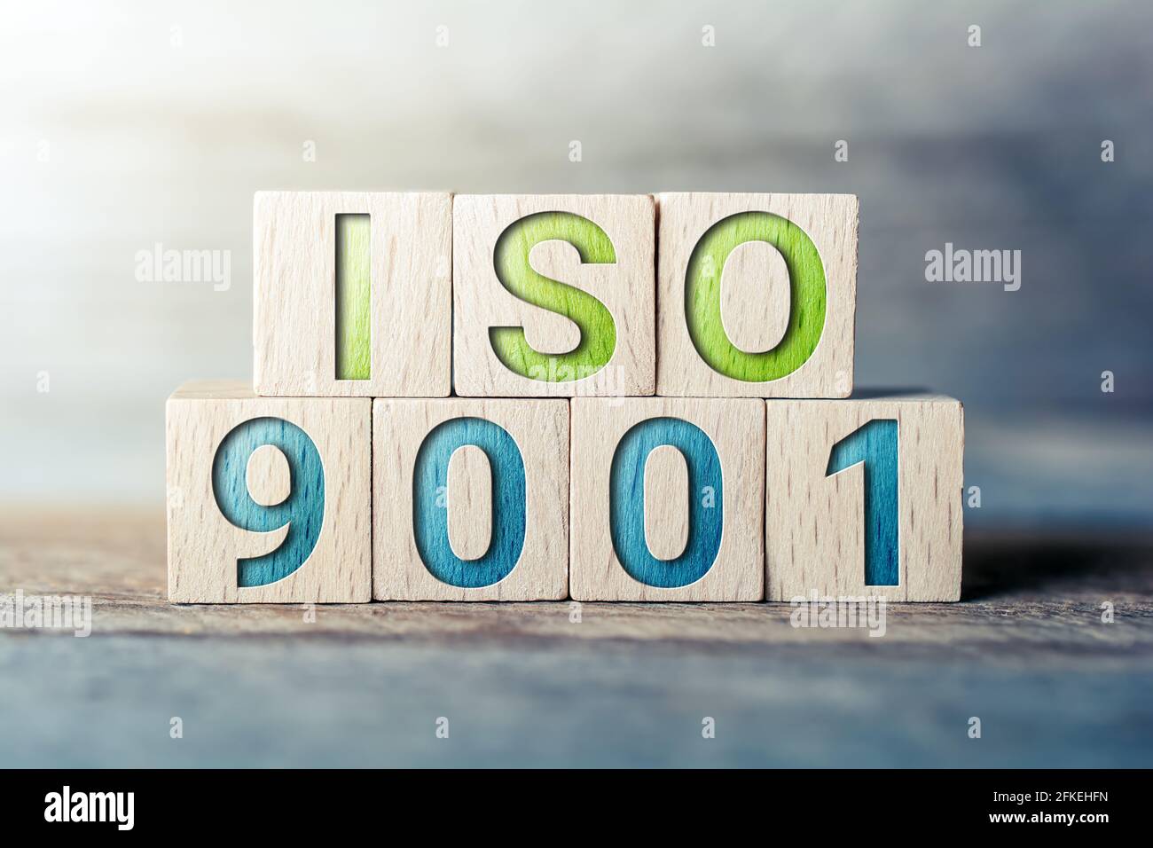 ISO 9001 Written On Wooden Blocks On A Board Stock Photo - Alamy