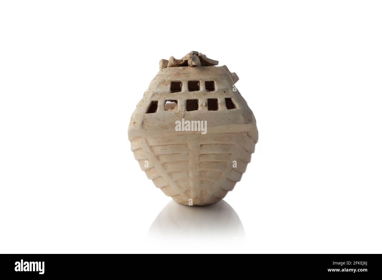 Sunken old ship isolated on white background. Decorative clay ship for ...