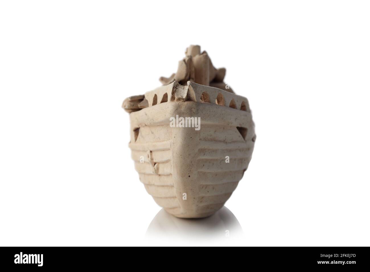Sunken old ship isolated on white background. Decorative clay ship for ...