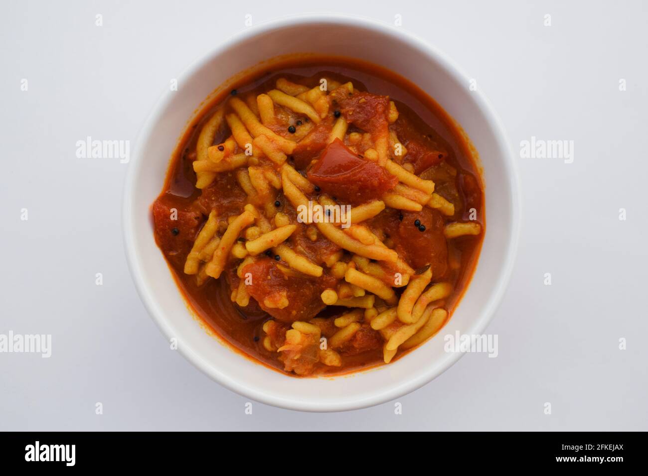 Gujarati popular side dish Sev tameta or Shev tamatar Curry homemade ...