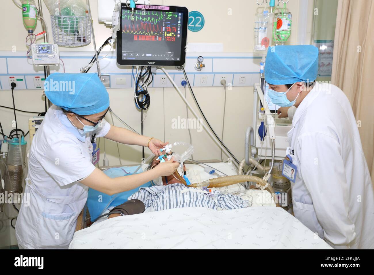 SHAOXING, CHINA - MAY 1, 2021 - A doctor monitors a patient's sputum ...