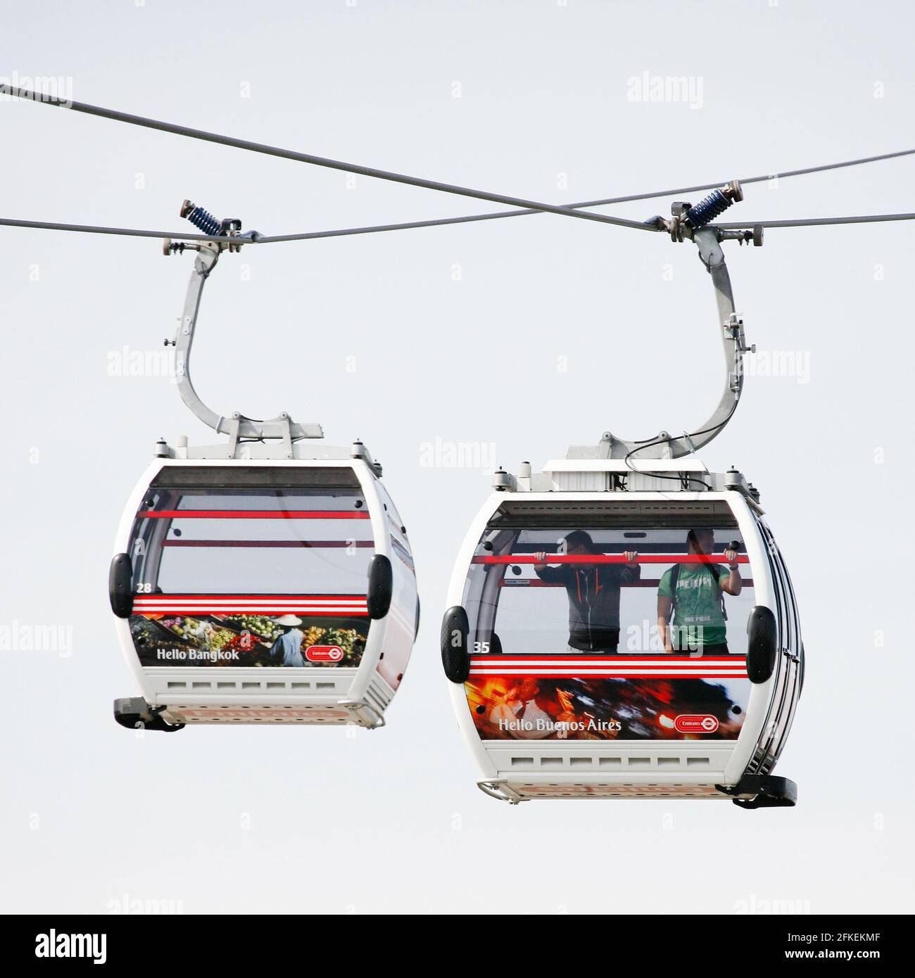 LONDON - MAY 26: Gondolas of the Emirates Air Line cable car, opened ...