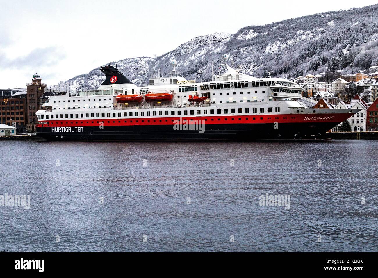Car and passenger coastal ferry Nordnorge at Bryggen quay, in the port ...