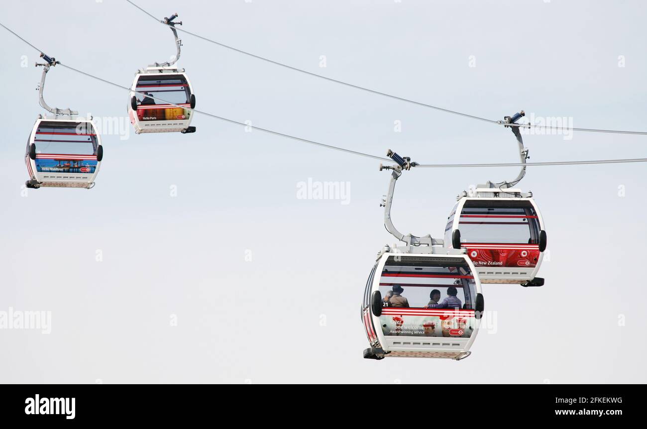 LONDON - MAY 26: Gondolas of the Emirates Air Line cable car, opened ...