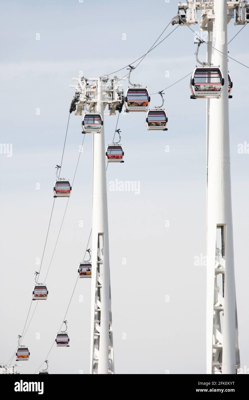LONDON - MAY 26: Gondolas of the Emirates Air Line cable car, opened ...