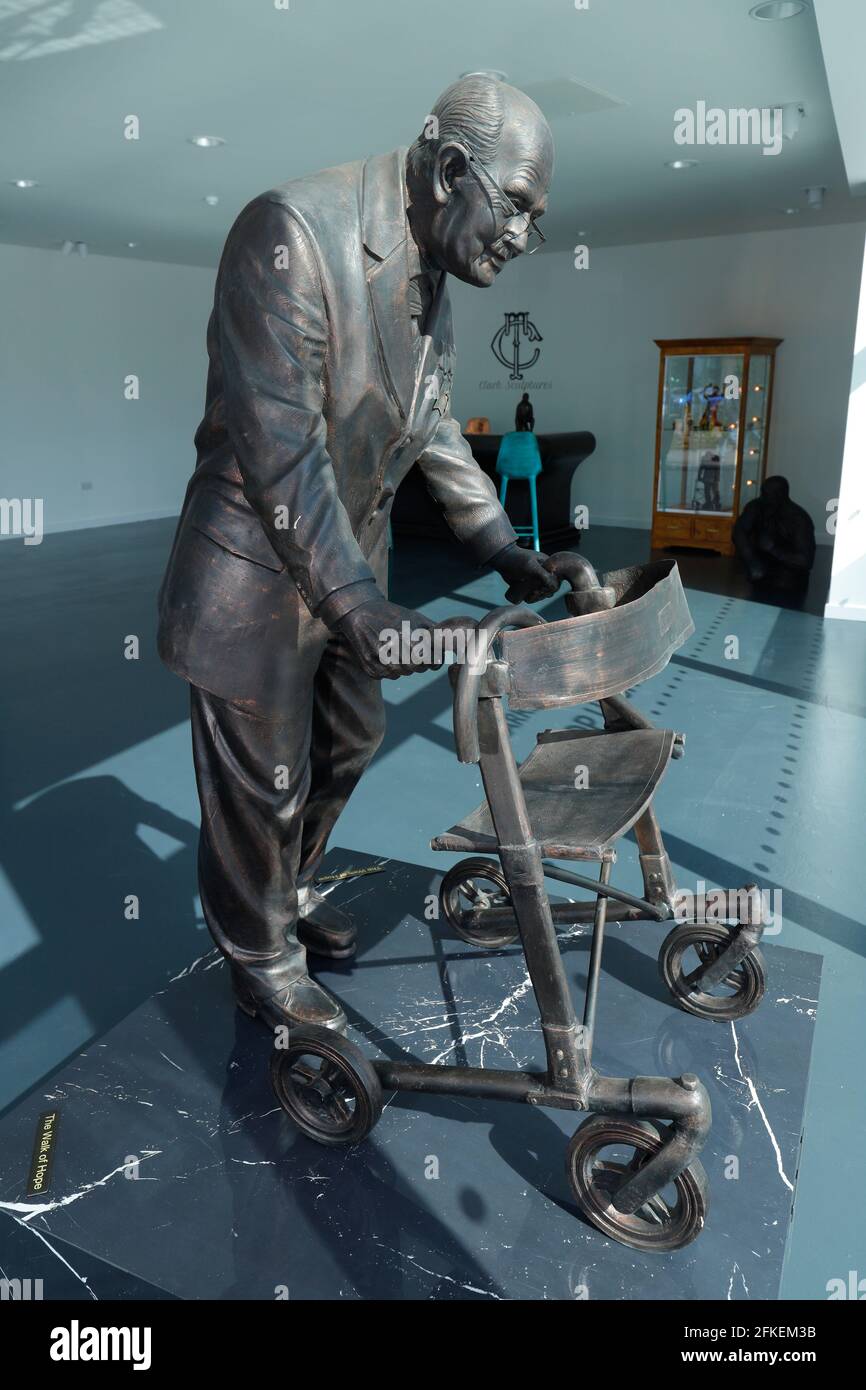 A resin statue of the late Sir Captain Tom Moore on display at Clark ...