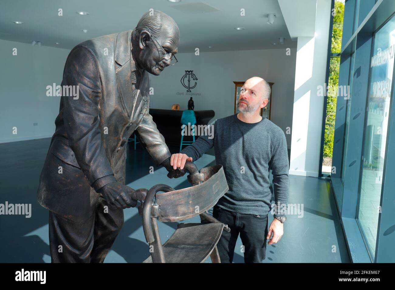 Sculptor Tony Clark with his resin statue of the late Sir Captain ...