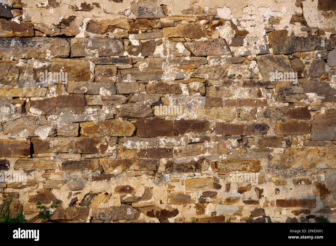 Ancient stone wall built in a traditional way. Rural village of Soria ...