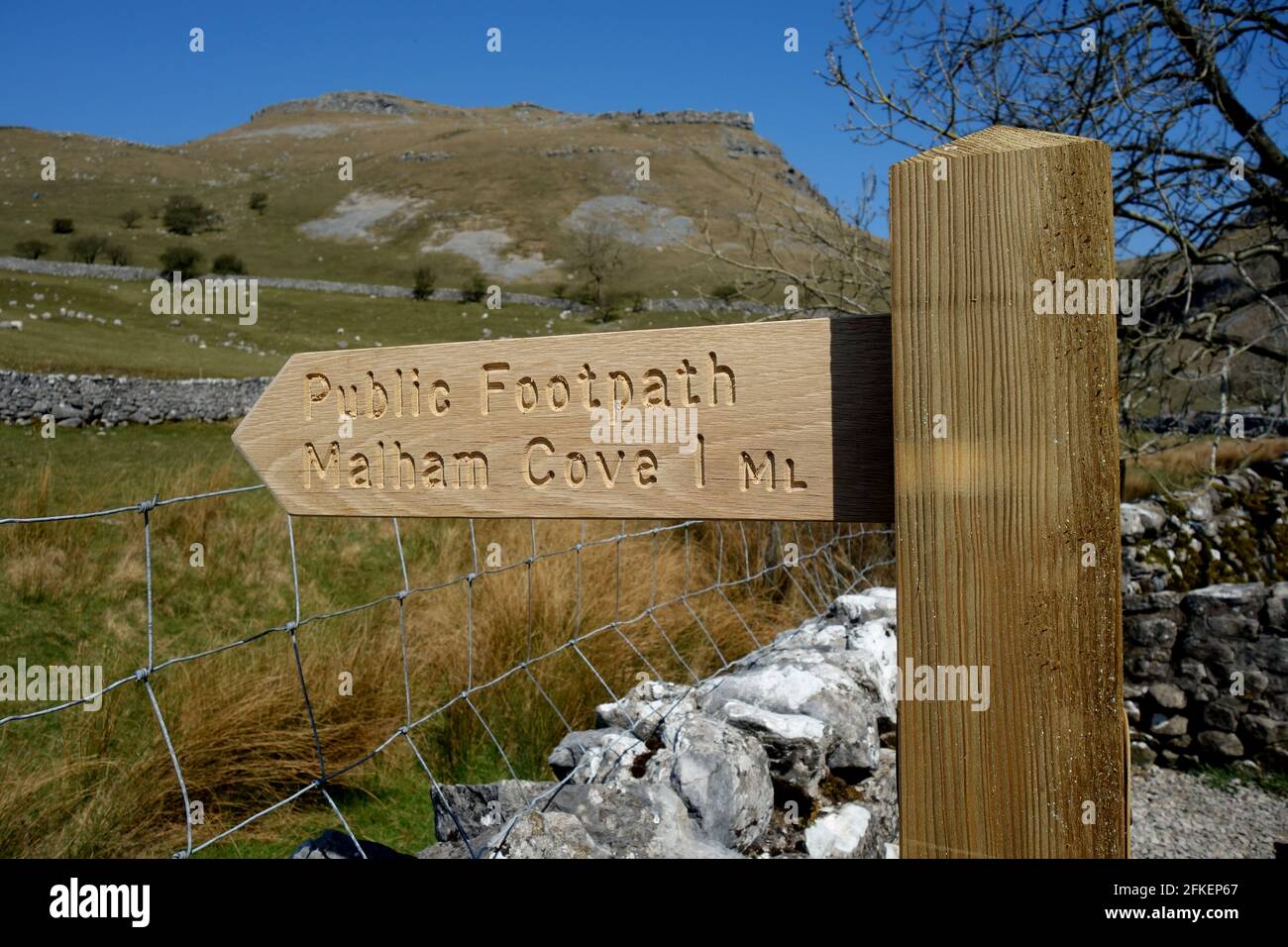 Wooden Public Footpath Signpost to Malham Cove from Gordale Scar in the ...