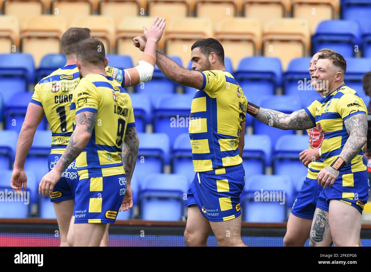 Greg Inglis (3) of Warrington Wolves celebrates scoring his first try ...