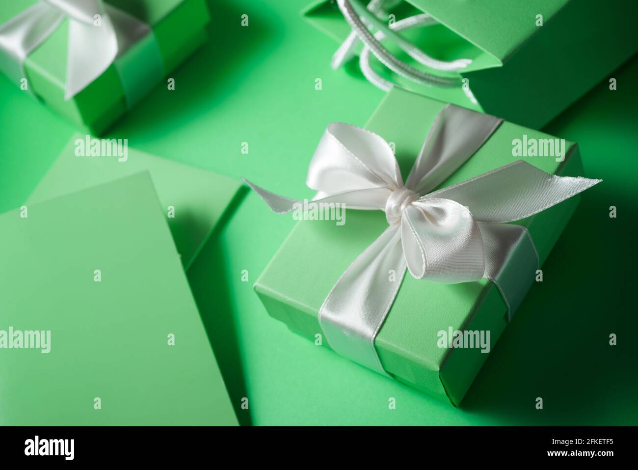 Luxury boxes tied with a white ribbon Stock Photo - Alamy