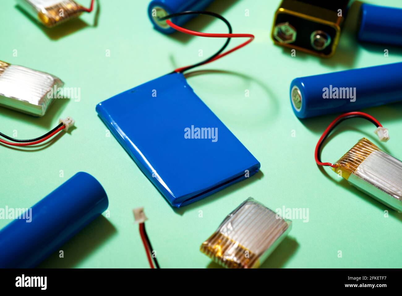 Colorful batteries on blue background hi-res stock photography and ...