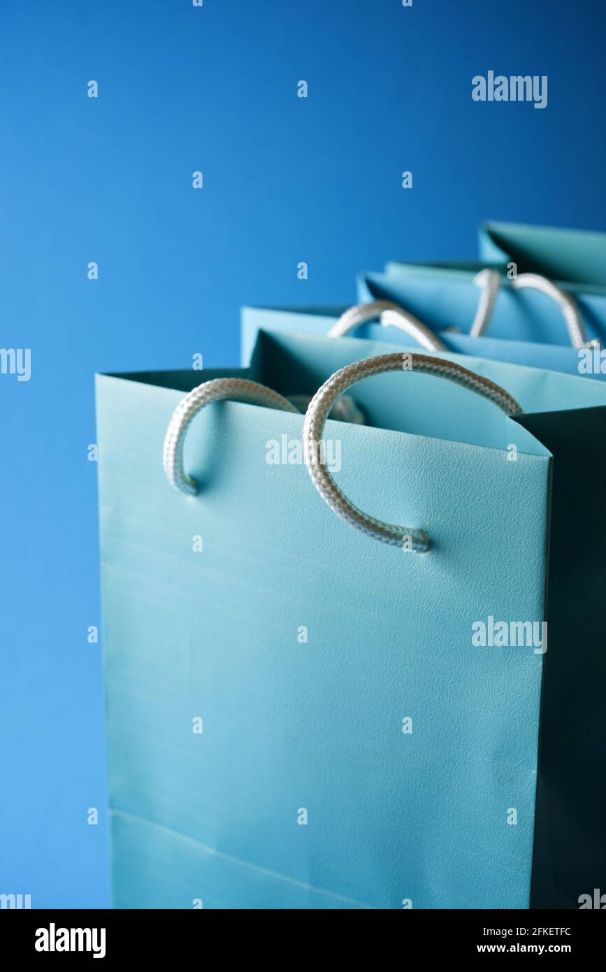 Luxury blue shopping bags view Stock Photo - Alamy
