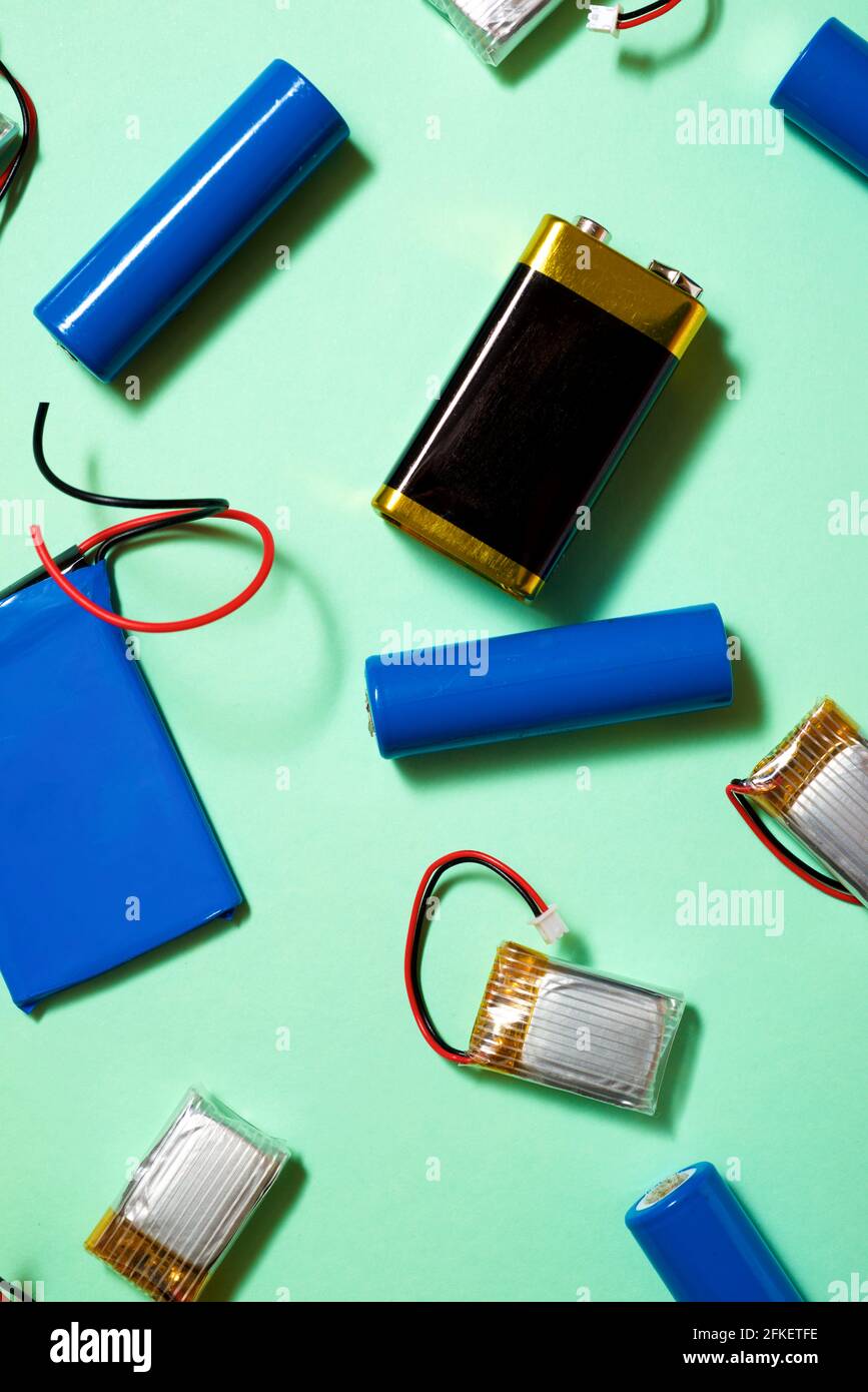 Colorful batteries on blue background hi-res stock photography and ...