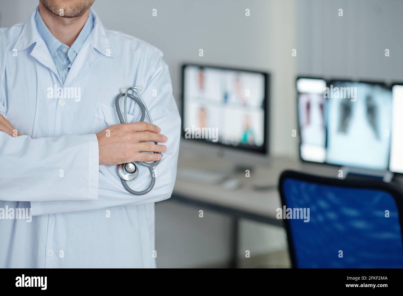 Cropped image of confident general practitioner with stethoscope ...
