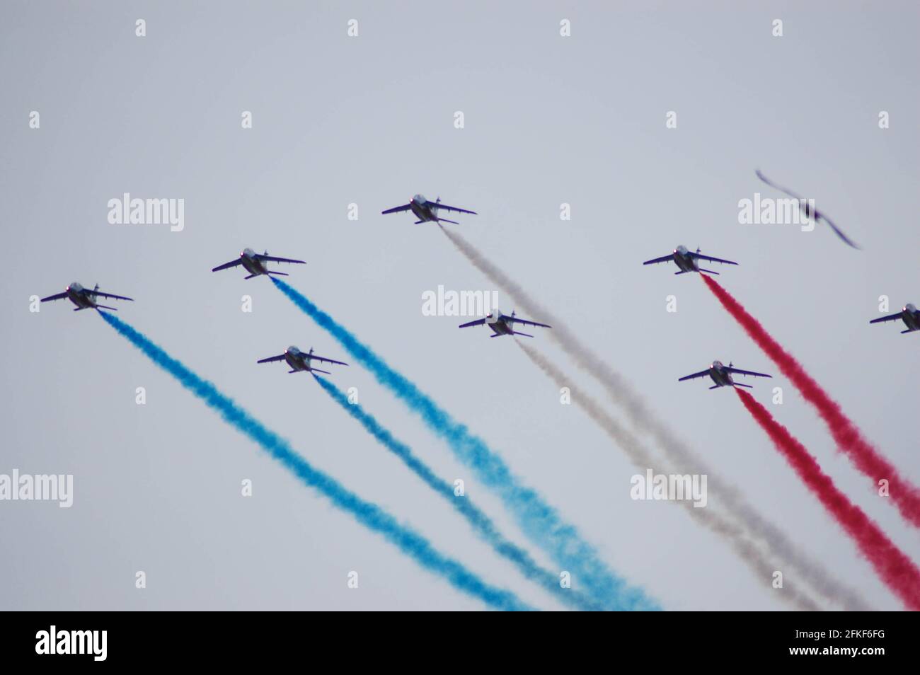 The Red Arrows display team over Jersey fast smoke coloured amazing ...