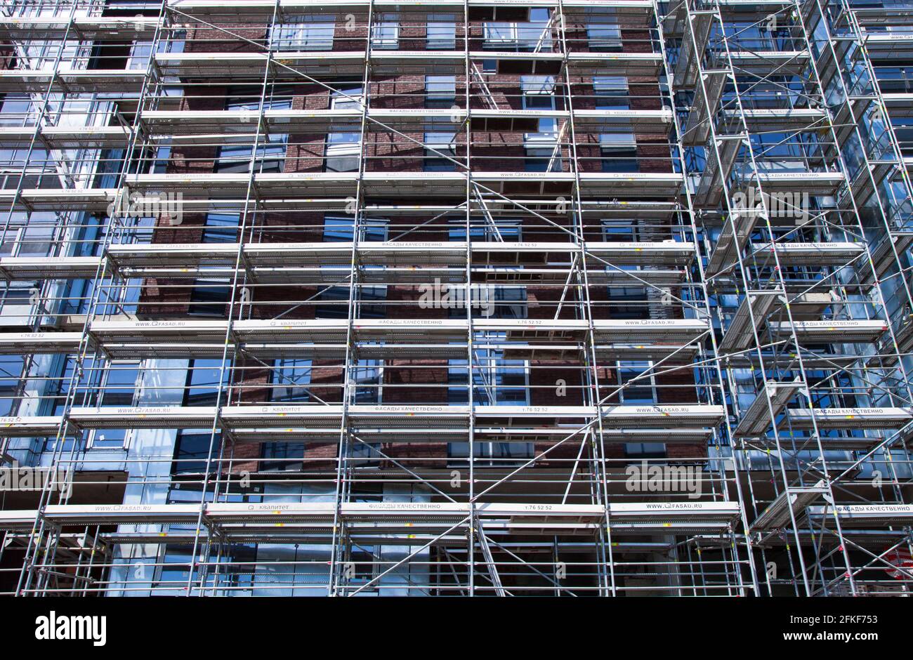 New building under construction. Front view Stock Photo - Alamy