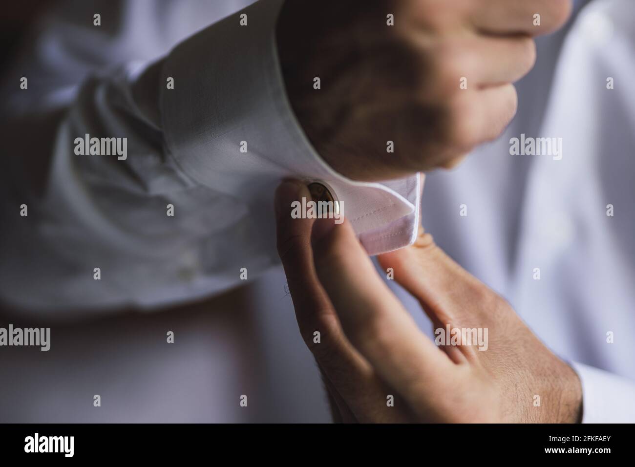 Fixing cuffs hi-res stock photography and images - Alamy