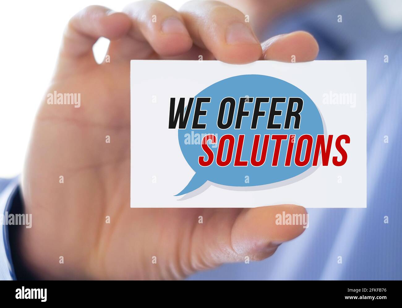Business card message - We offer solutions Stock Photo - Alamy