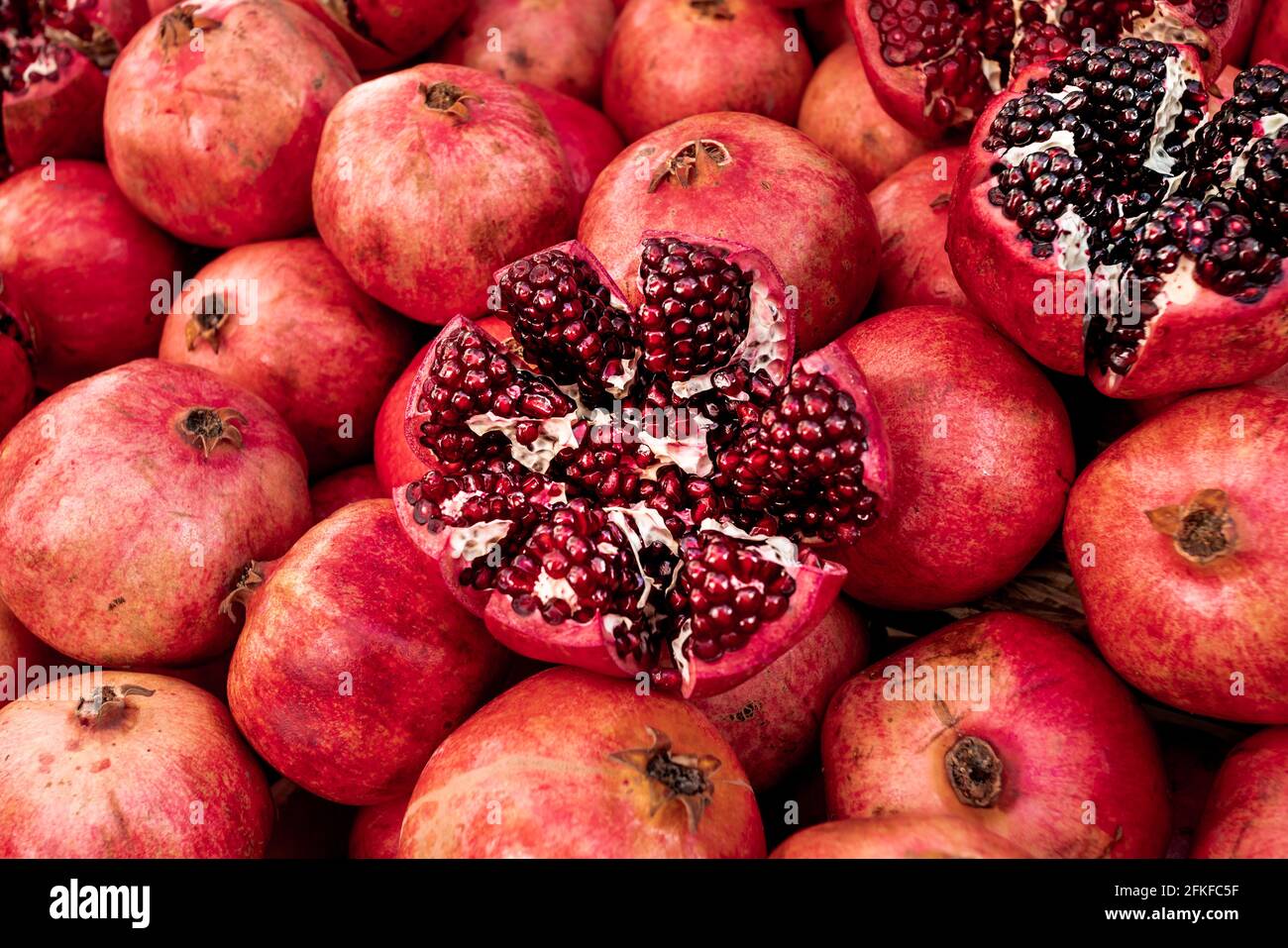 Cracked pomegranate. Ripe Pomegranates Background Stock Photo - Alamy