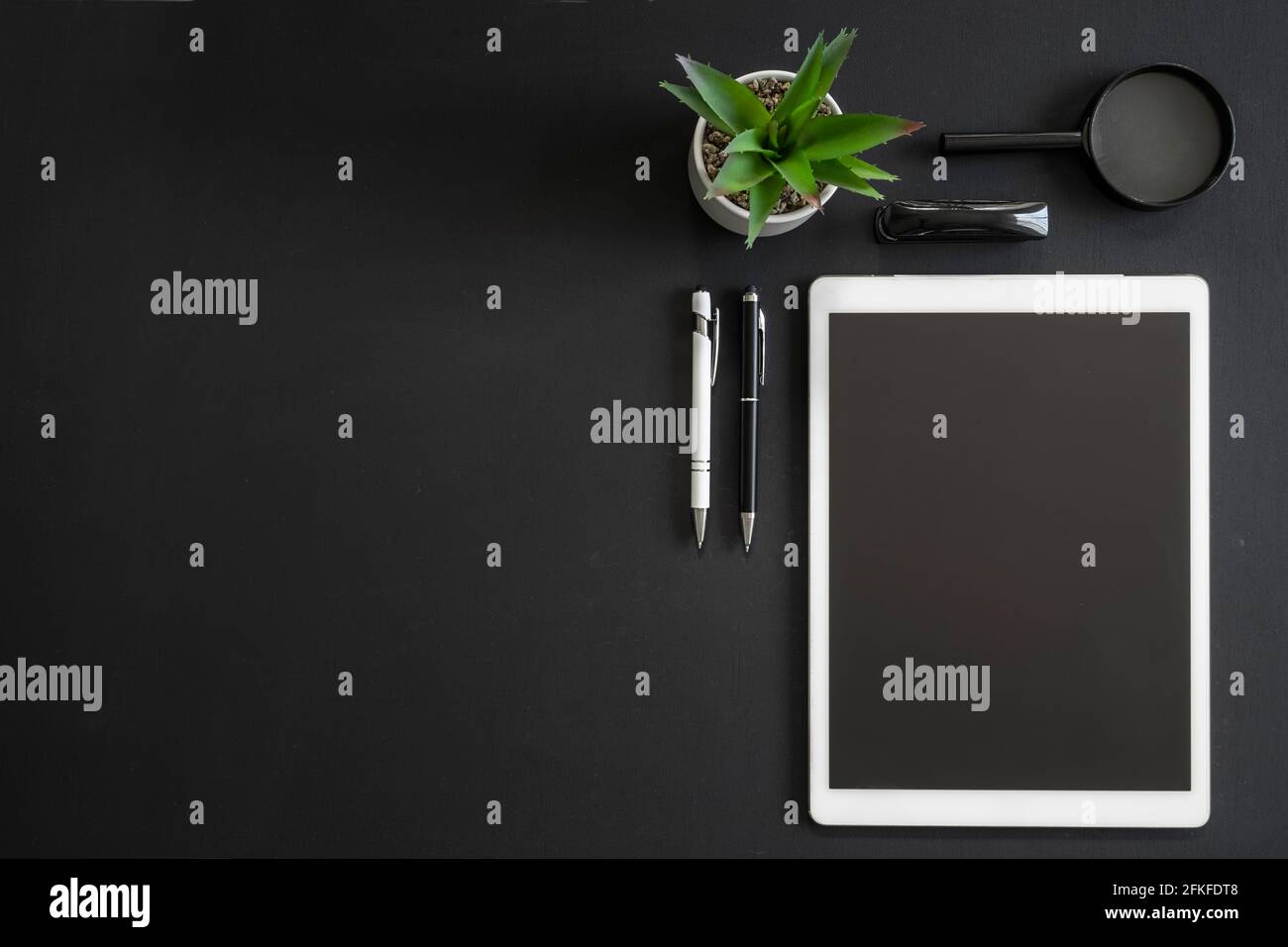 Office black workspace with office supplies and copy space on black ...