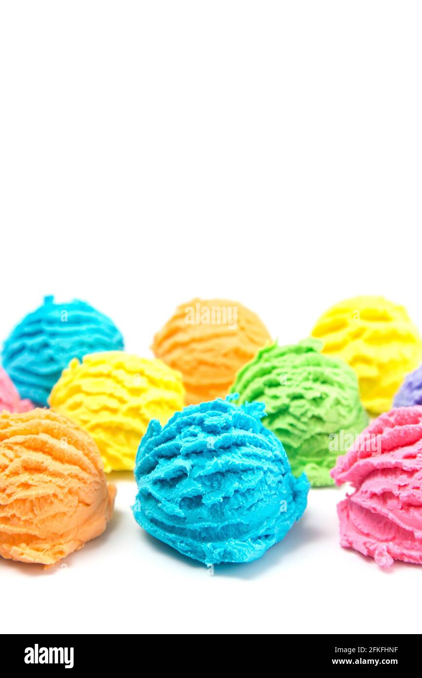 Scoops of Rainbow Ice Cream on a White Table Stock Photo - Alamy