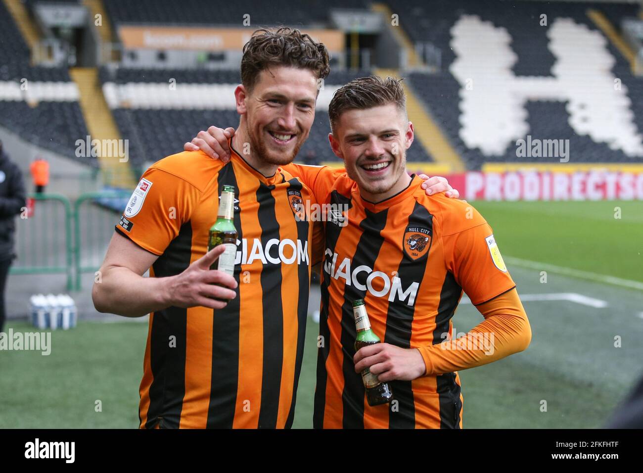 Richard Smallwood #6 and Regan Slater #18 of Hull City celebrate with a ...