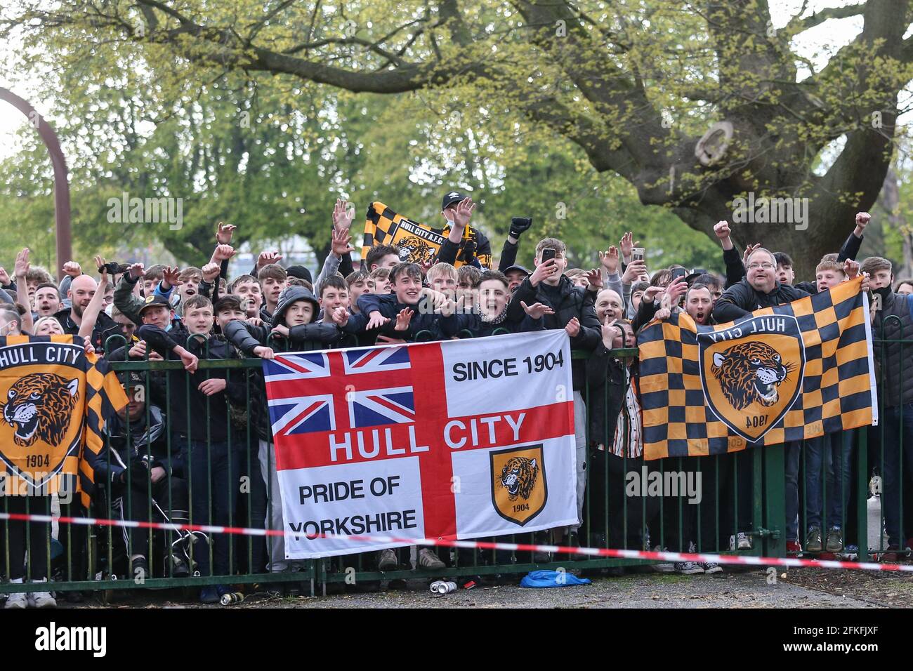 A large crowd of Hull City fans congregate outside the KCOM Stadium Waiting for the Hull City ...