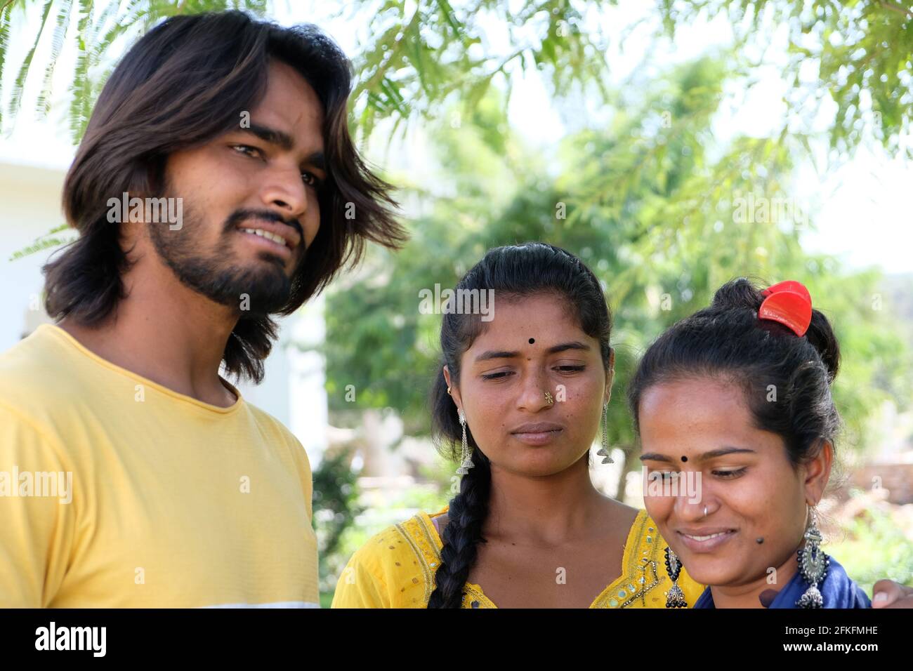 Group of young Indian friends enjoying their time in a park Stock Photo ...