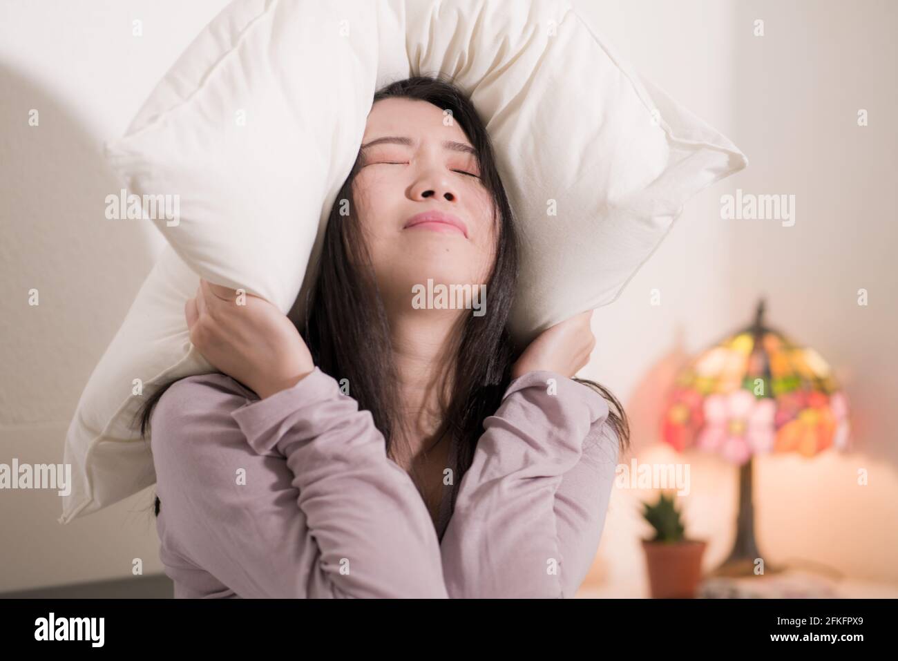 young Asian woman depressed - young beautiful and sad Japanese girl on ...