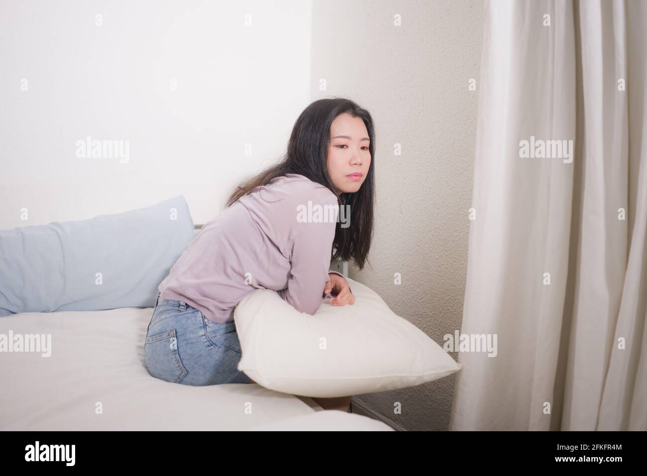 young Asian woman depressed - young beautiful and sad Japanese girl on ...