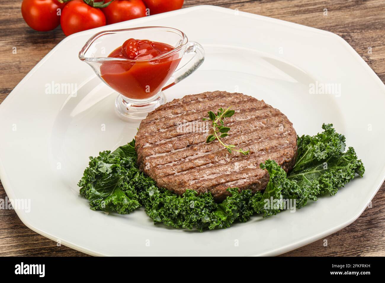 Grilled tasty beef cutlet for burger Stock Photo - Alamy
