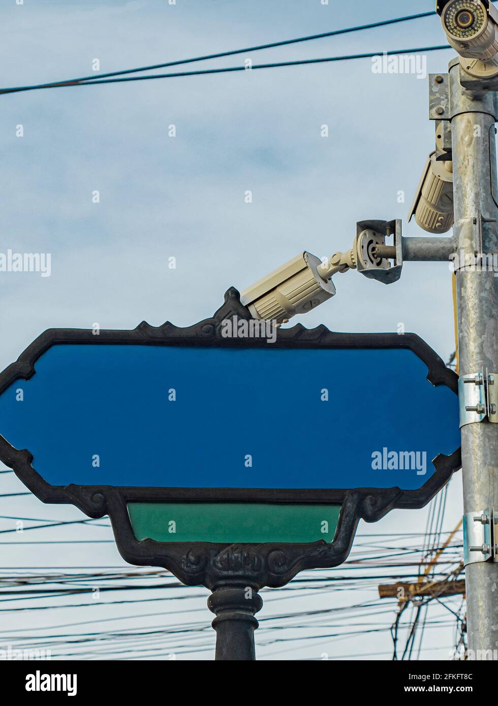 Blank empty blue typical Asian street road sign in Bangkok Thailand ...