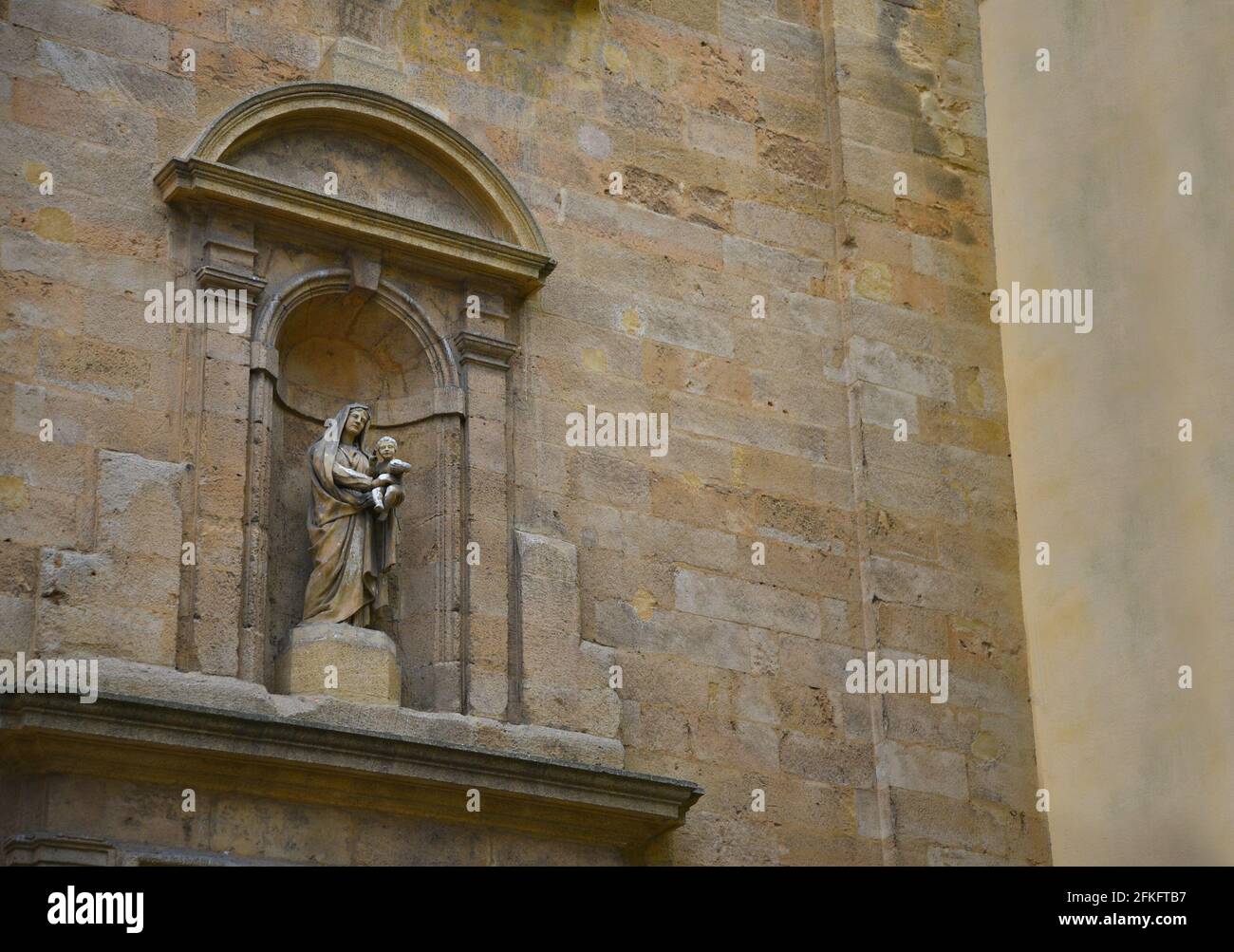 Baroque style building facade with a religious icon statue in Aix-en ...