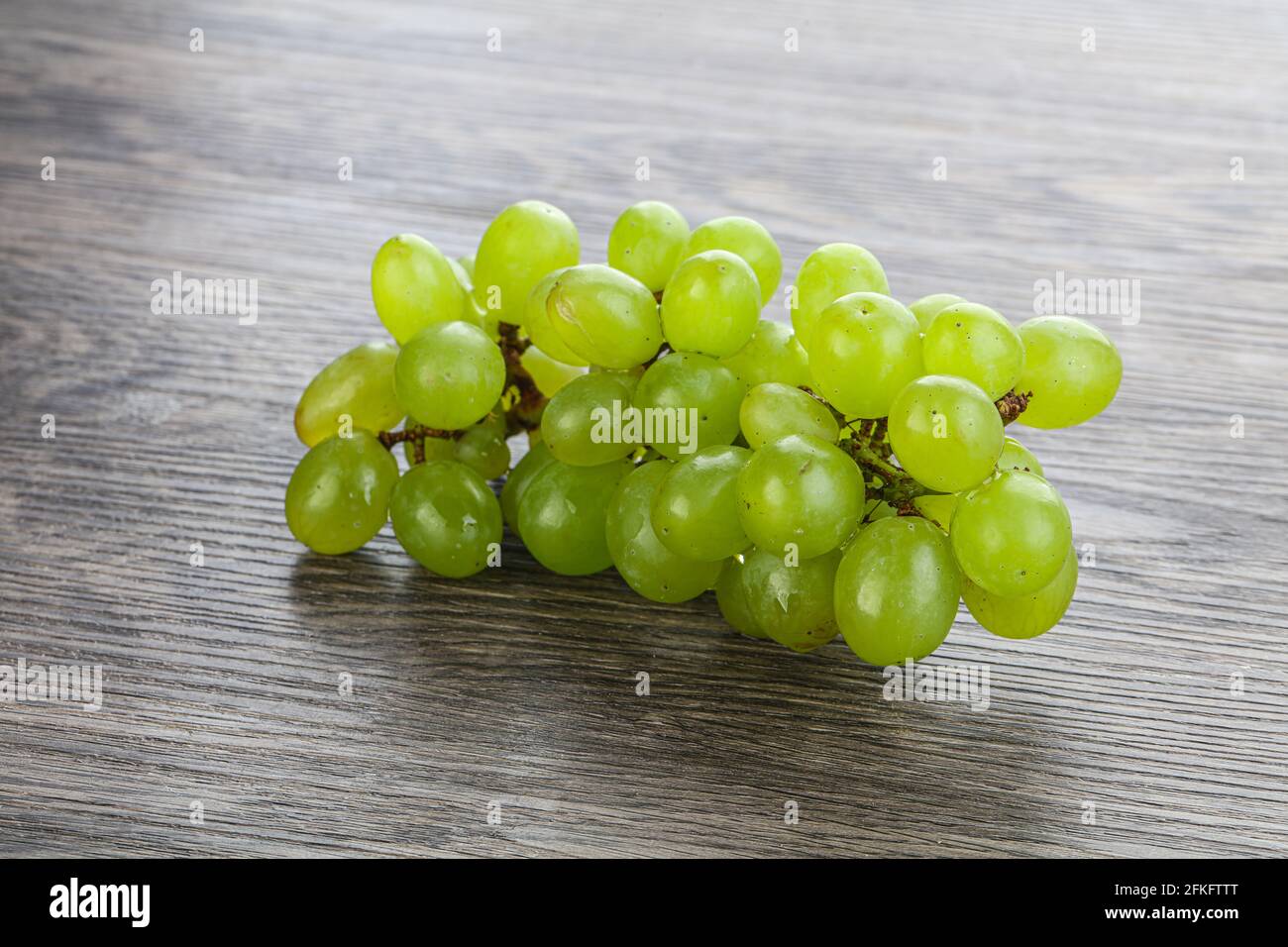 Ripe sweet green grape branch isolated Stock Photo - Alamy