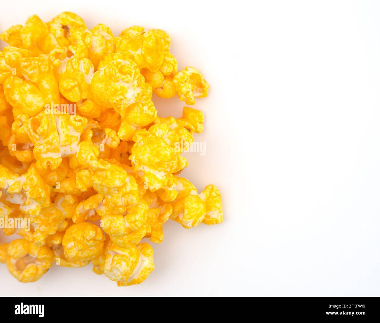Yellow Cheddar Cheese Popcorn on a White Background Stock Photo - Alamy